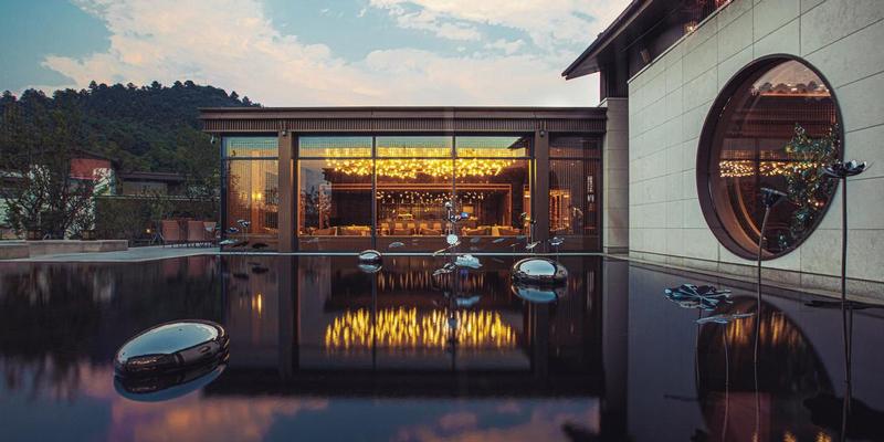 Dusit opens serene lakeside wellness resort with 18 hot spring pools in ...