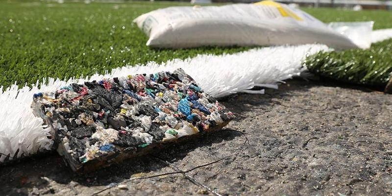 Adidas builds sustainable sports pitch using 1.8m plastic bottles ...